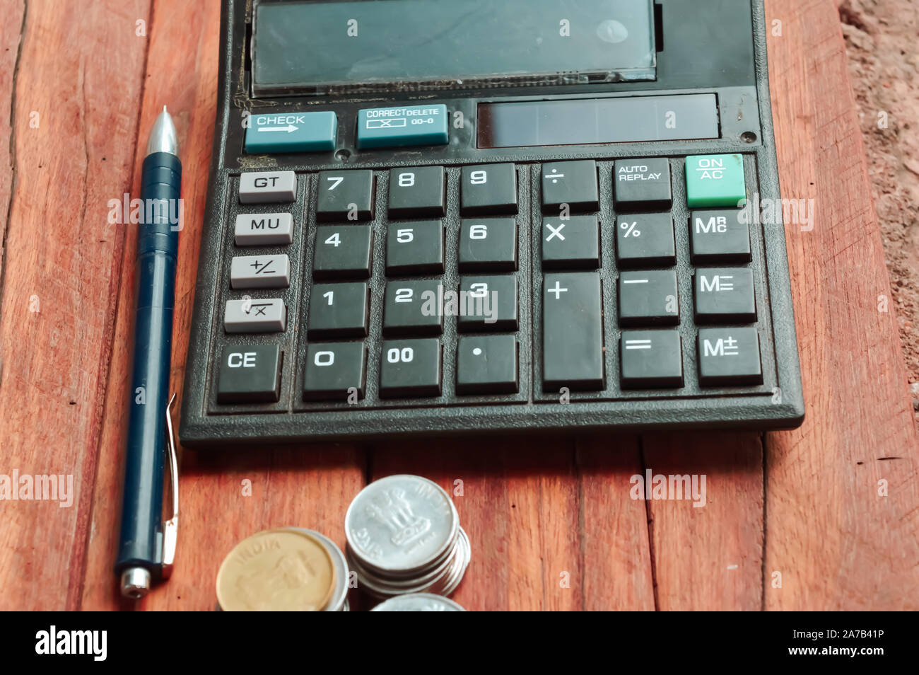 Money, coins, calculator on the table. Concept calculation of the ...