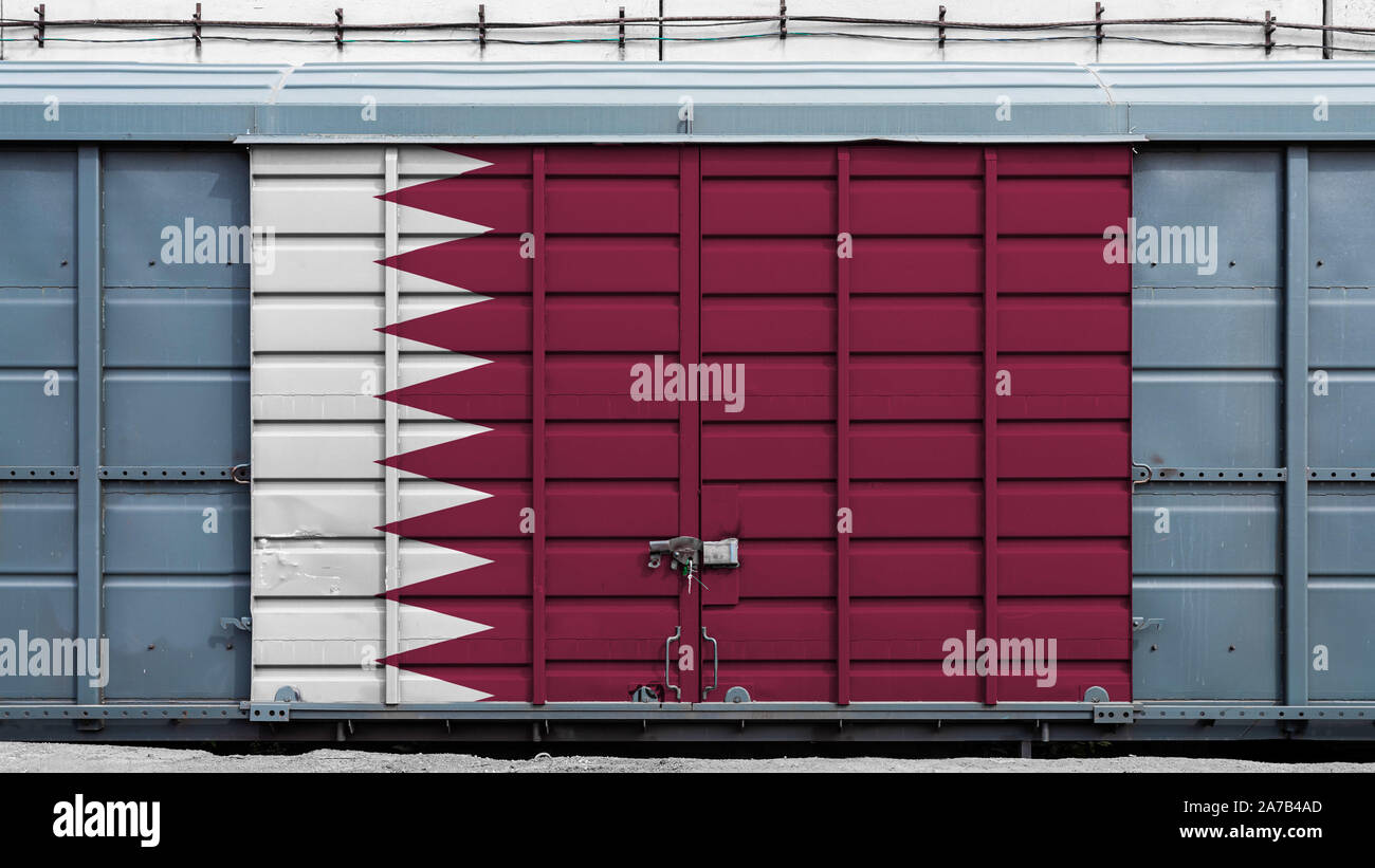 Front view of a container train freight car with a large metal lock ...