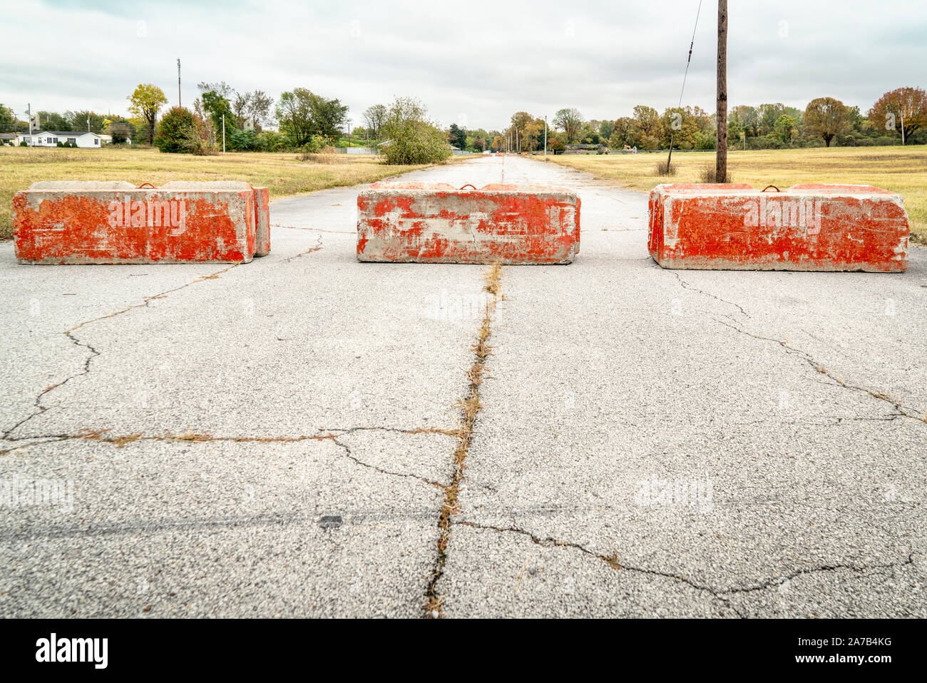 Heavy concrete roadblocks blocking highway or street. Obstacle, dead ...