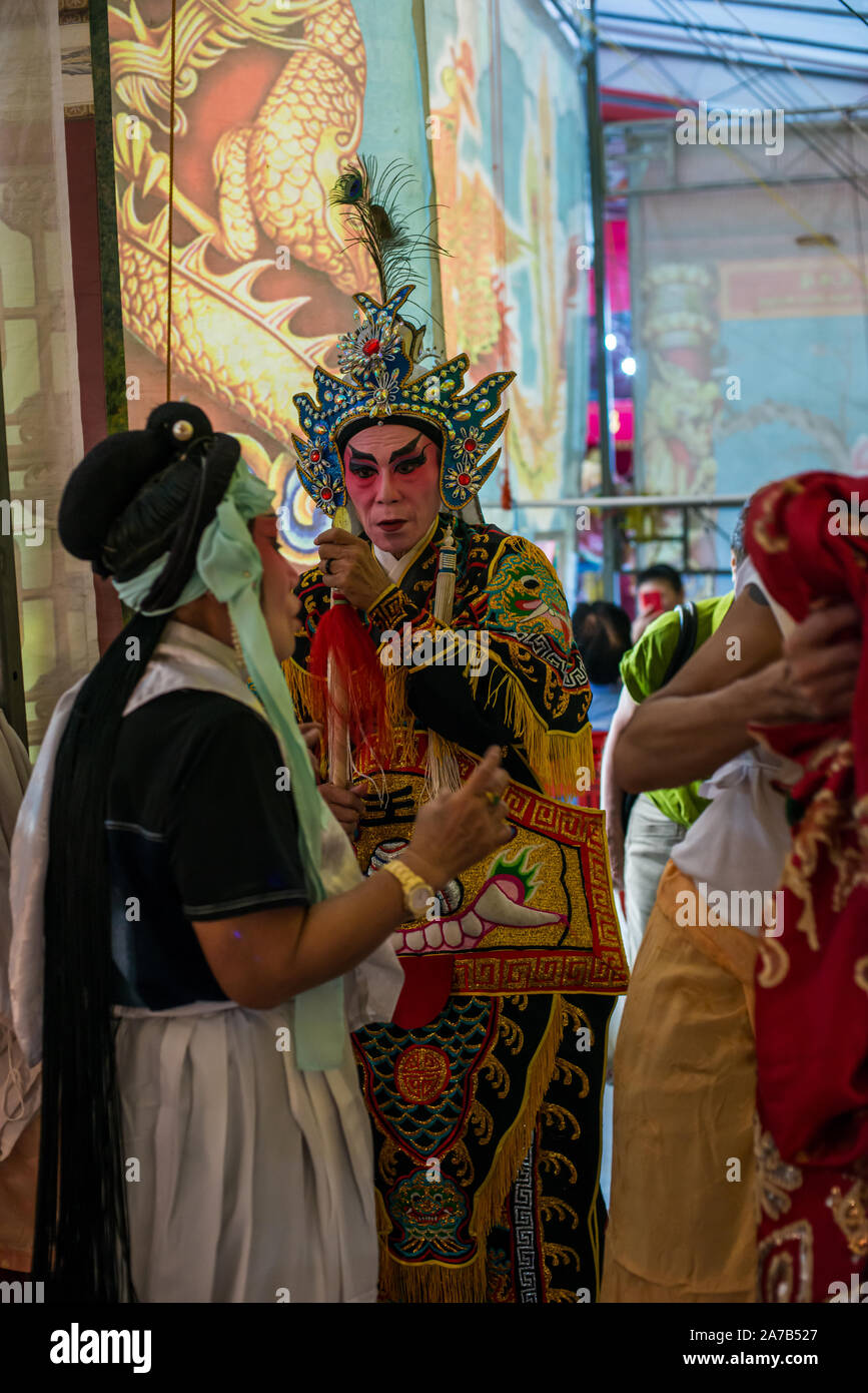 Chinese Teochew Opera. Performers at backstage getting ready to perform ...