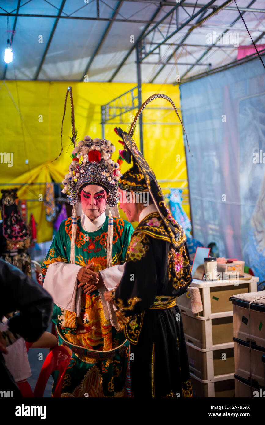 Chinese Teochew Opera. Performers at backstage getting ready to perform ...