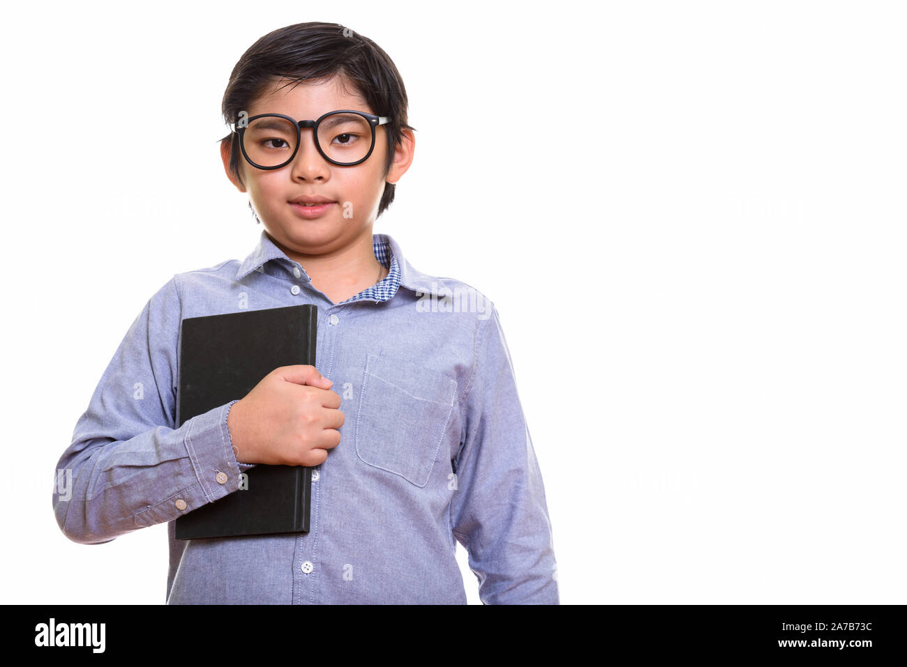 Studio shot of Japanese boy isolated against white background Stock ...