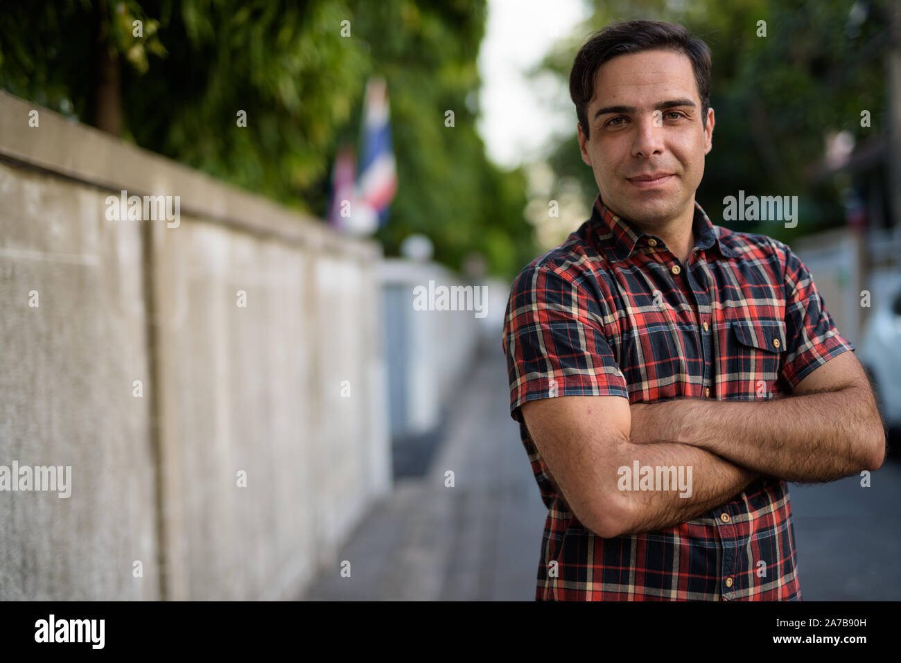 Handsome Persian man in the streets outdoors Stock Photo - Alamy