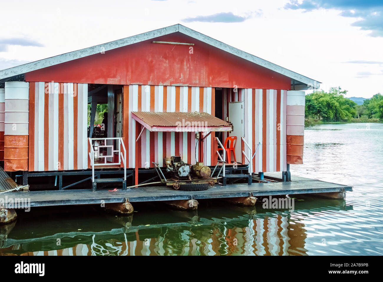 The old electricity generator for floating wooden raft house by using ...