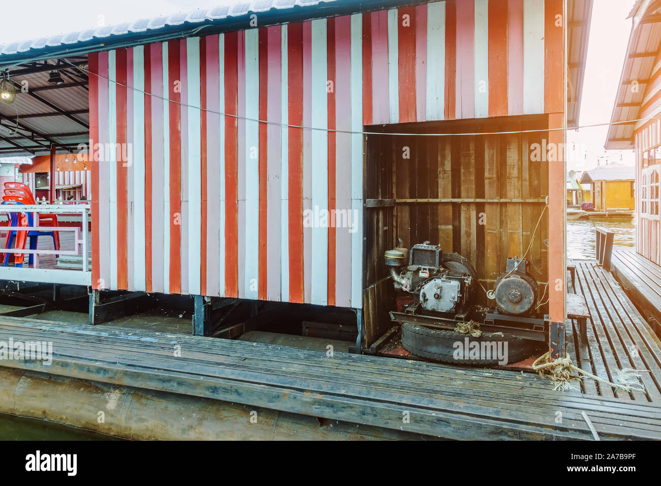 The old electricity generator for floating wooden raft house by using ...