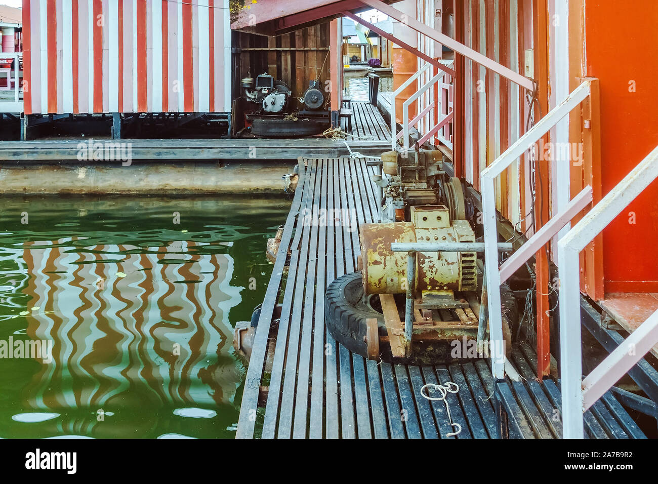 The old electricity generator for floating wooden raft house by using ...