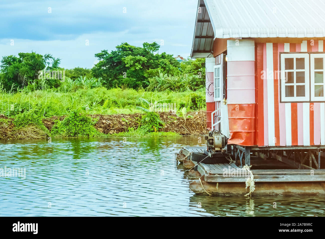 The old electricity generator for floating wooden raft house by using ...