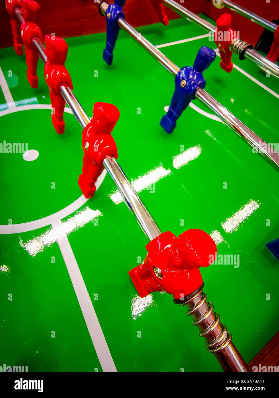 Foosball. Table with red and blue players detail perspective Stock ...