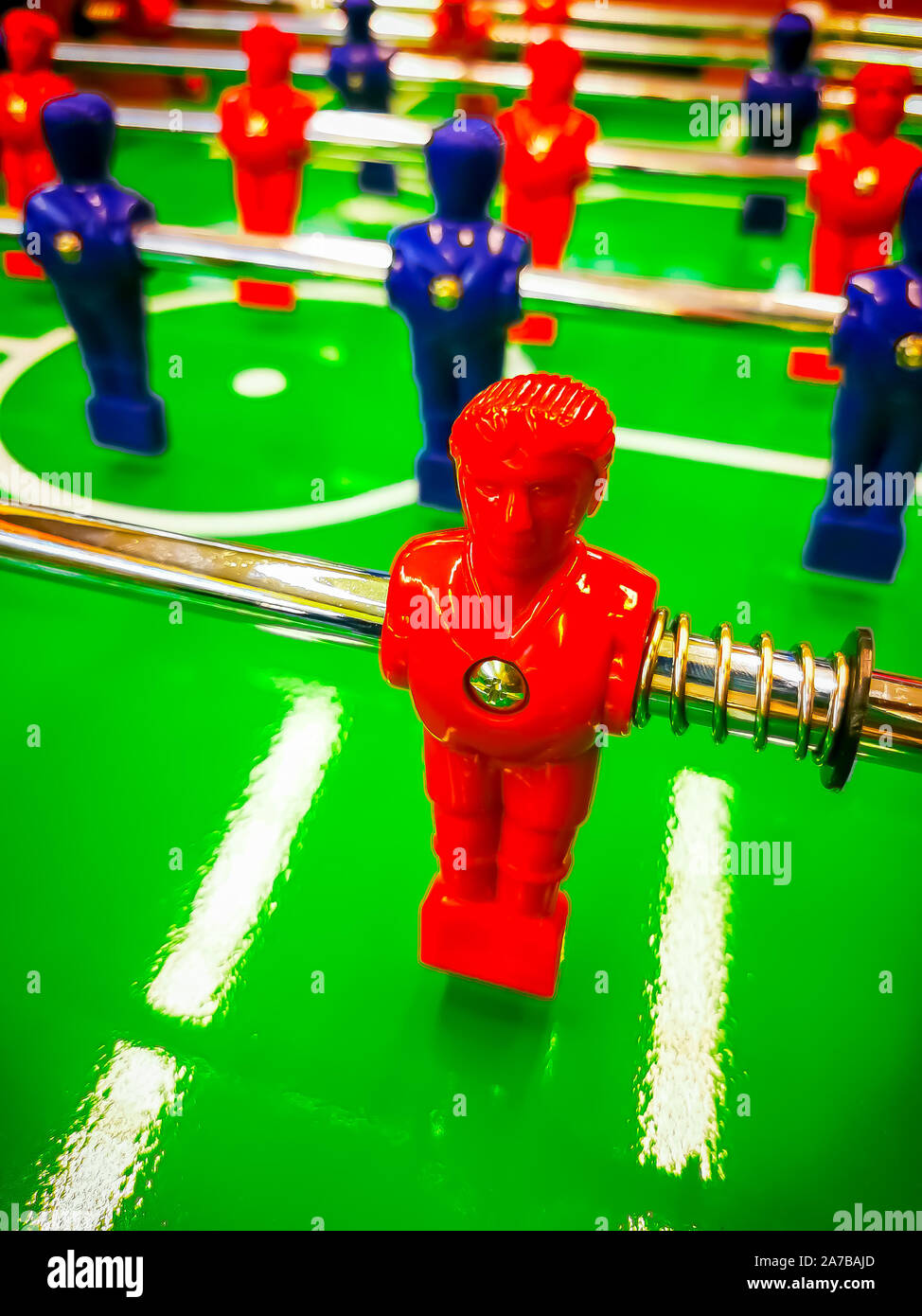 Foosball. Table with red and blue players detail perspective Stock ...