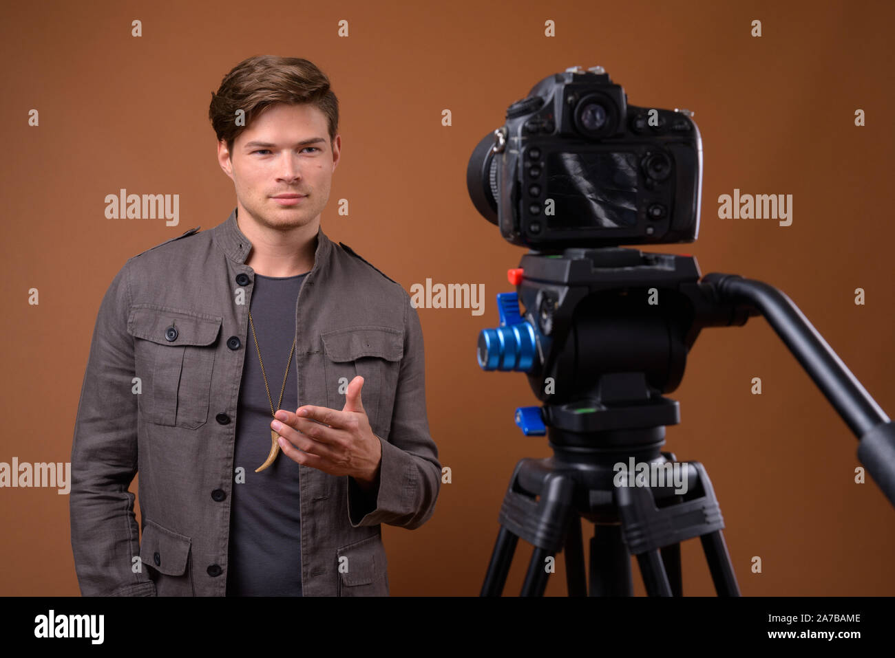 Handsome man talking camera hi-res stock photography and images - Alamy