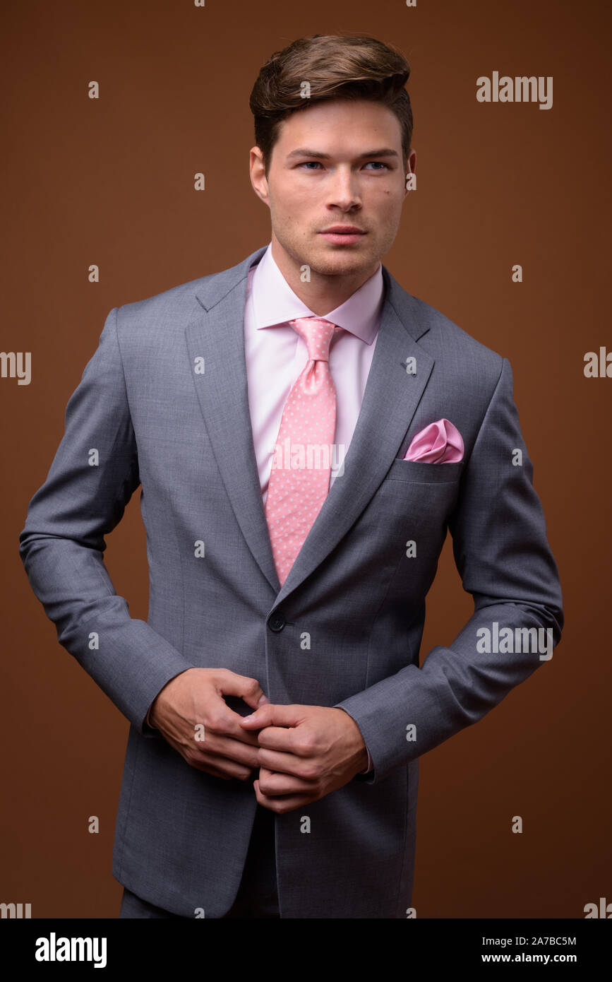 Man in pink suit hi-res stock photography and images - Alamy