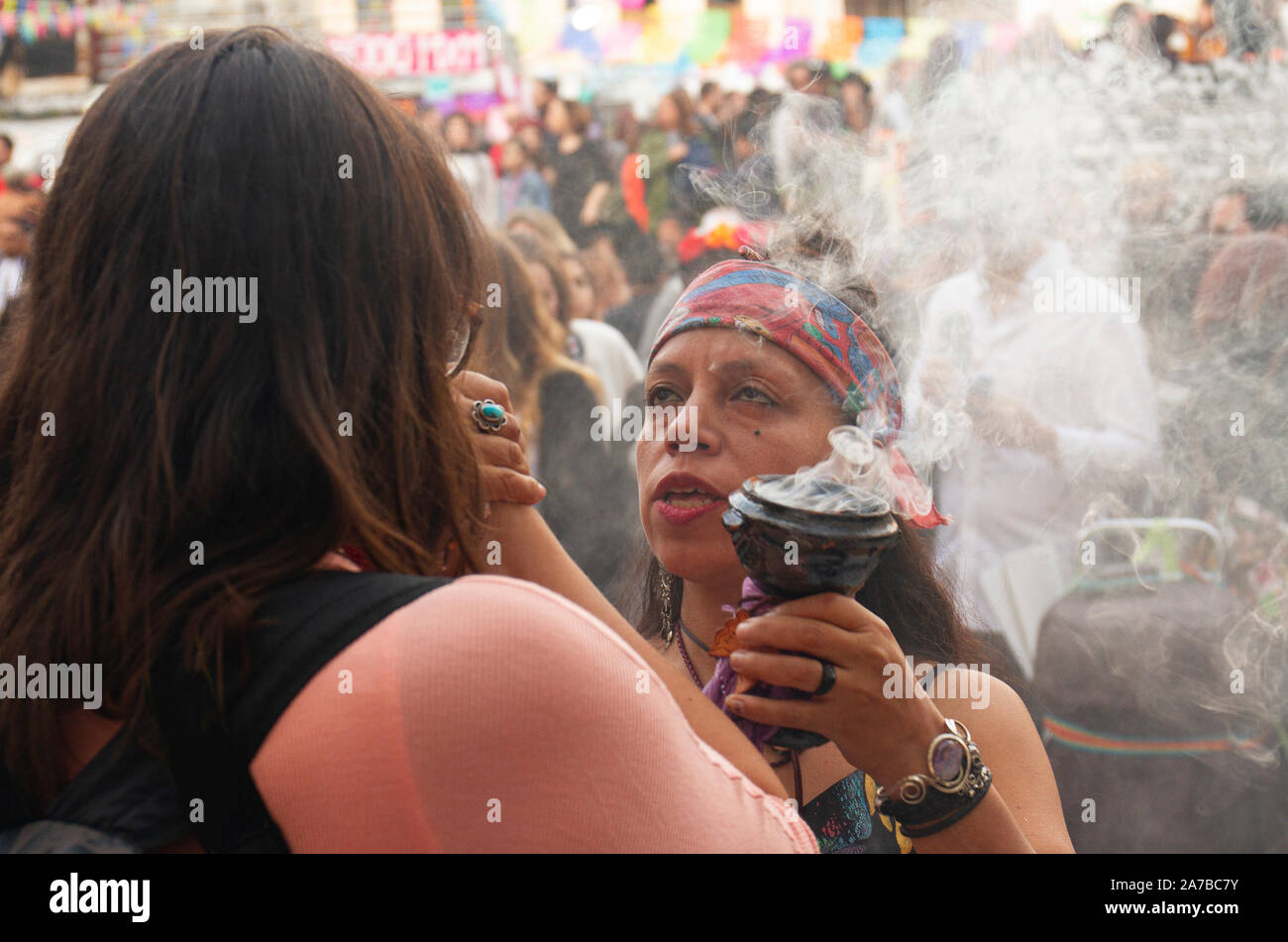 A shaman emulates spiritual performance during the halloween ...