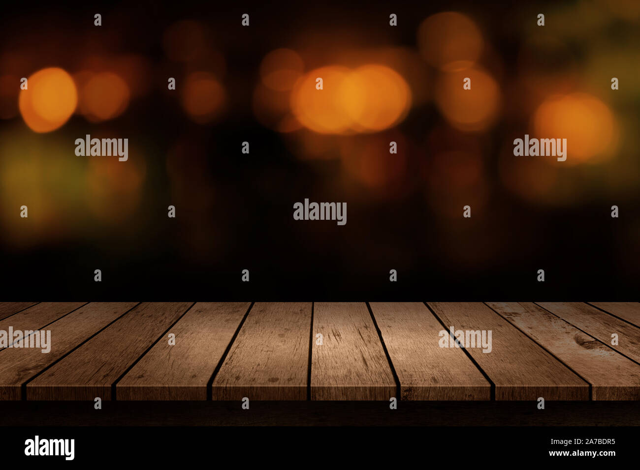 Wooden table with a view of blurred beverages bar backdrop. Blur cafe ...