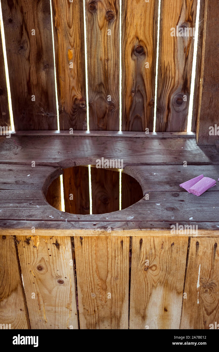 old eco-friendly rustic toilet Stock Photo - Alamy