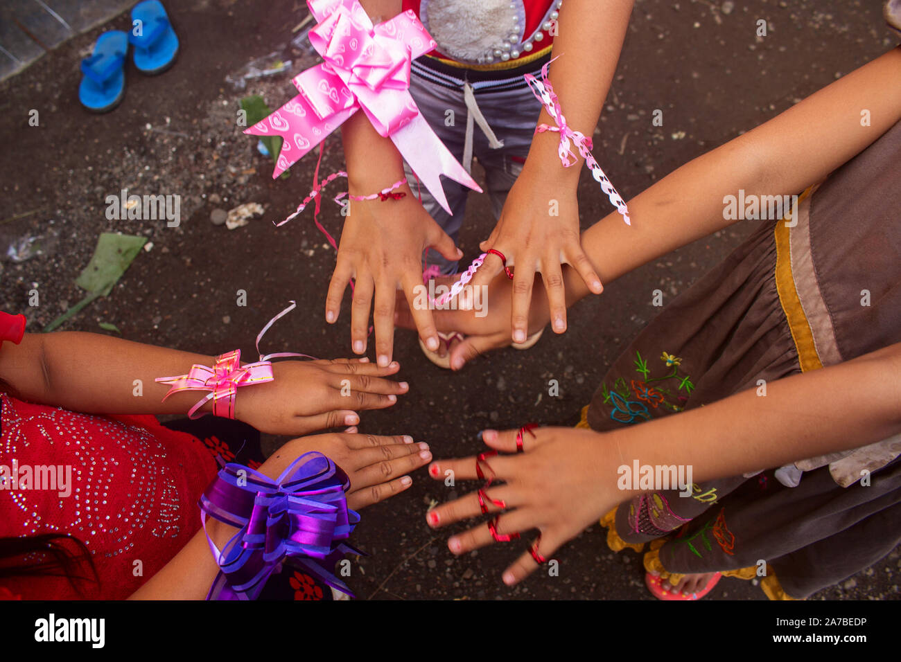 Top Down View Asian Little Girls Wear Colorful String and Ribbon on ...