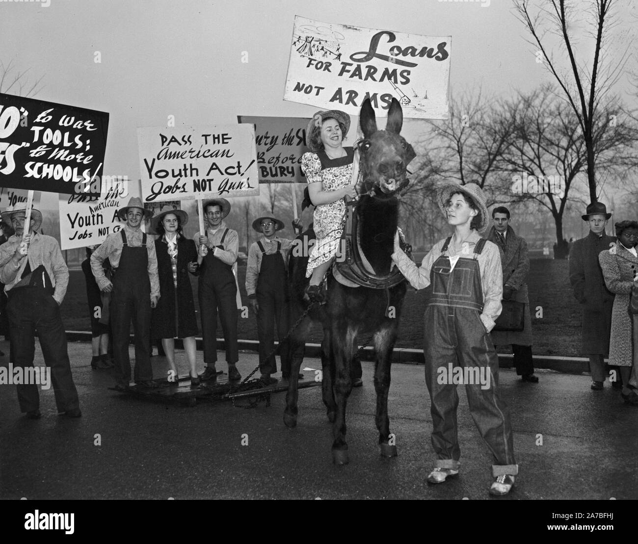 Anti-war protesters against World War II holding signs ca. 1940 Stock ...