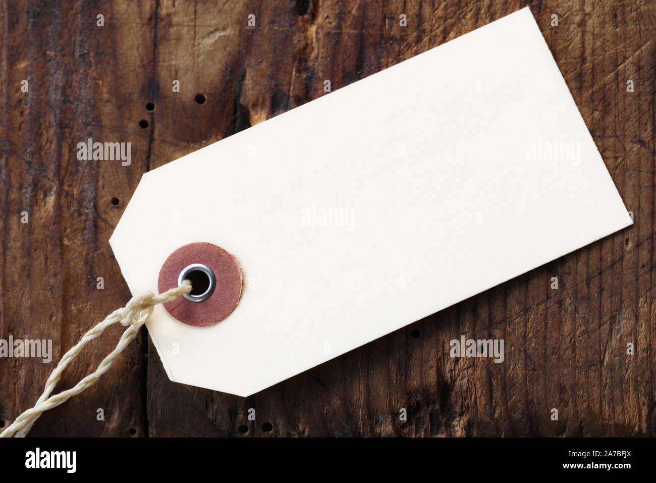 Blank Paper Label On A Wooden Background Stock Photo - Alamy
