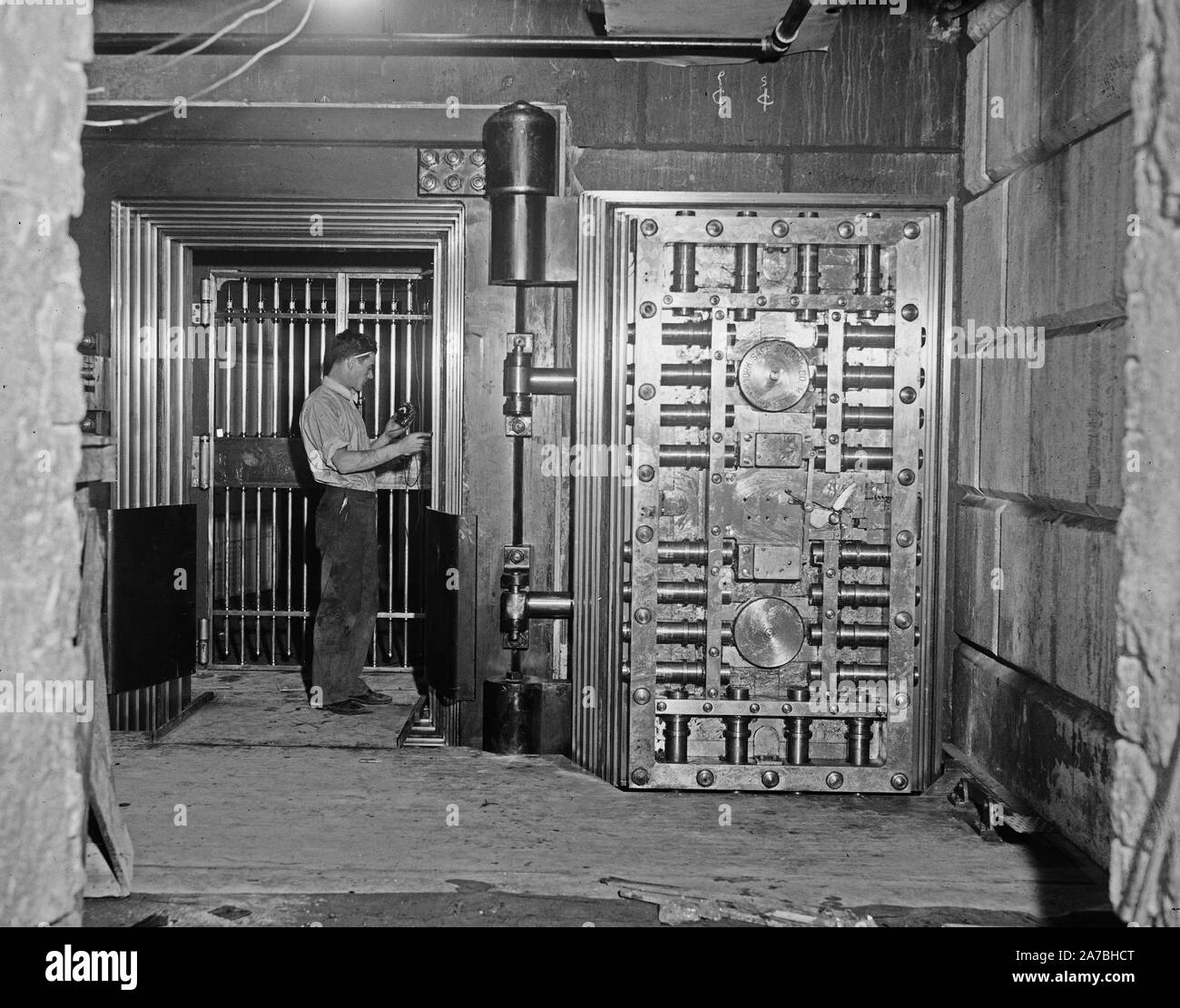 Man working in large Black and White Stock Photos & Images - Alamy