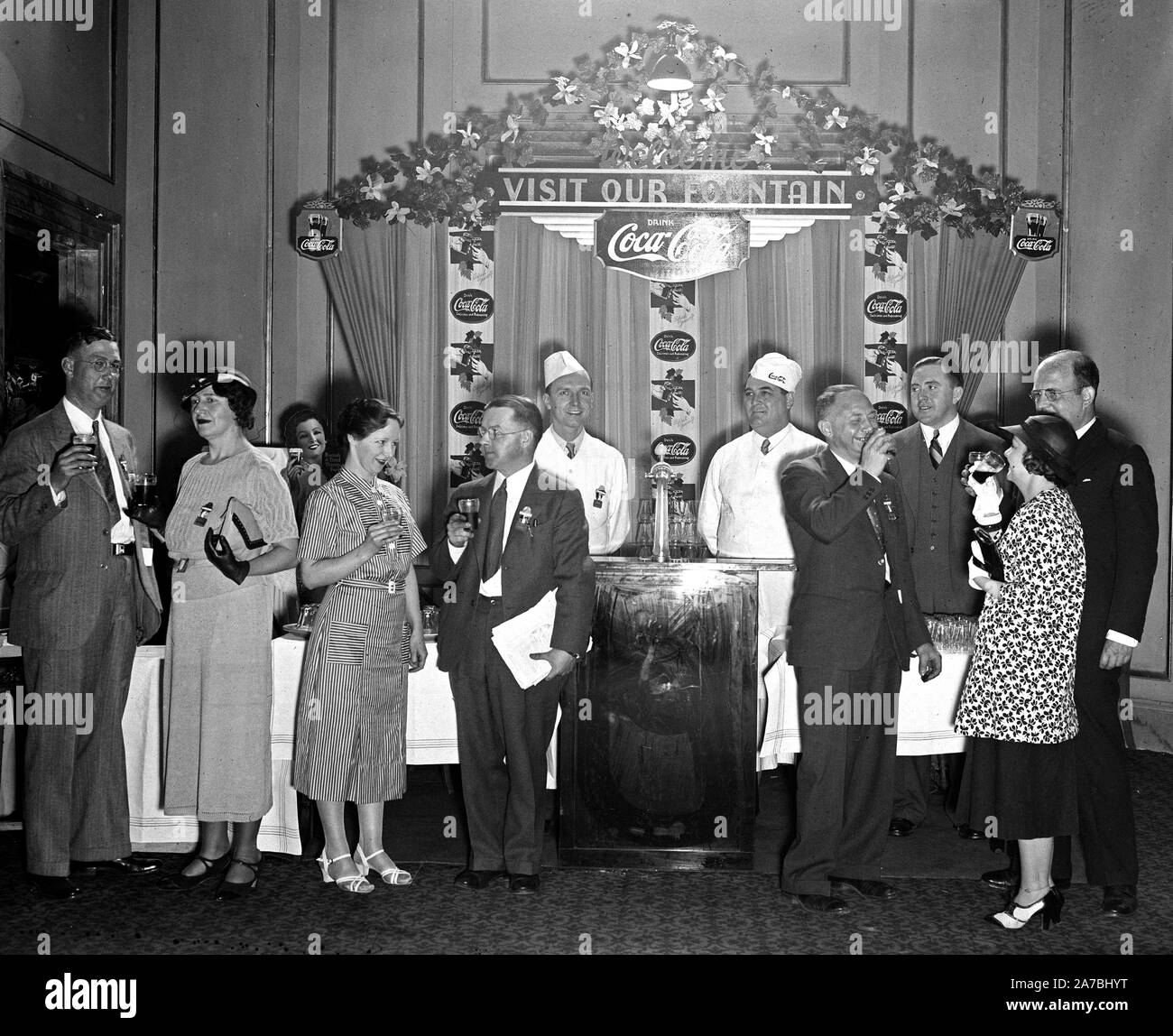 Coca-Cola display and people drinking coca-cola ca. 1934 Stock Photo ...