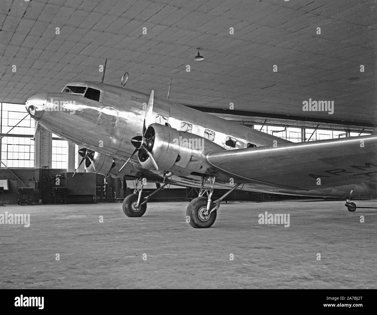 Passenger airplane ca. 1936 inside a hangar Stock Photo - Alamy