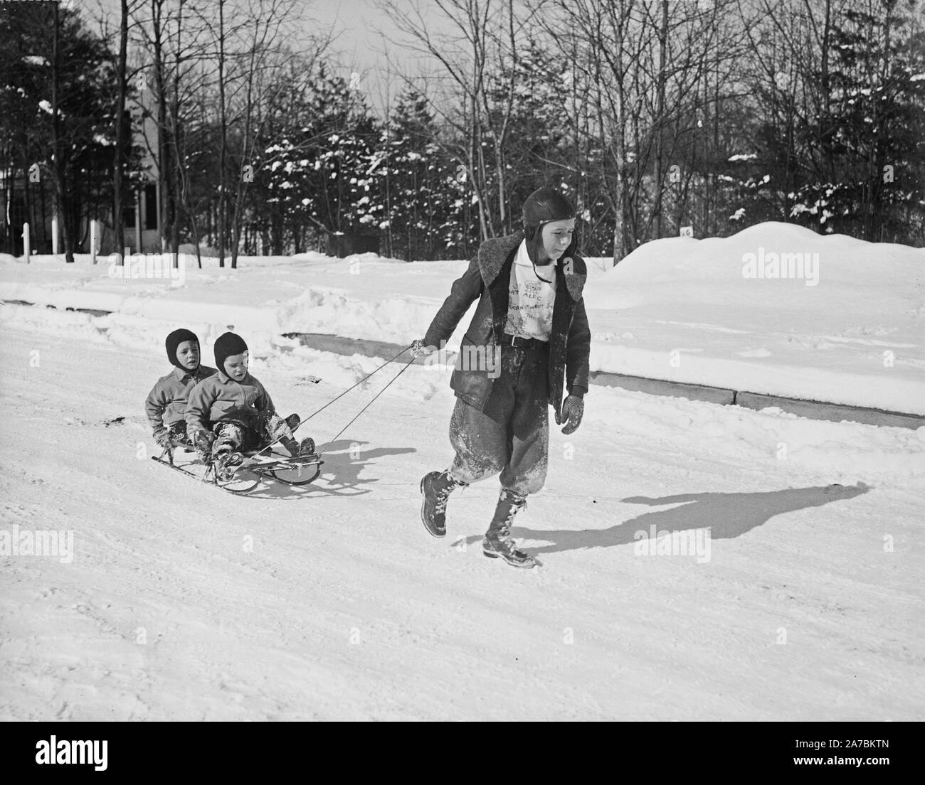 1930s children playing in the snow hi-res stock photography and images ...