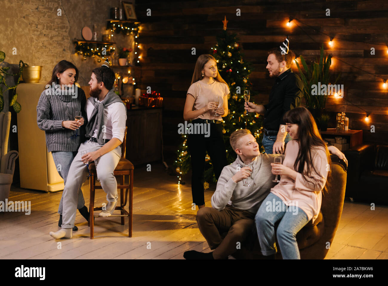 Couples talking party hi-res stock photography and images - Alamy