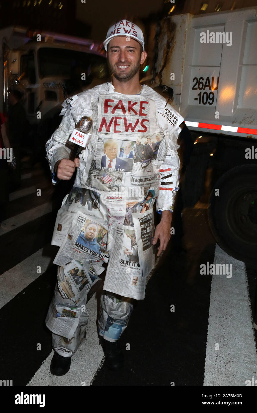New York, New York, USA. 31st Oct, 2019. A parade goer dressed as 'Fake ...
