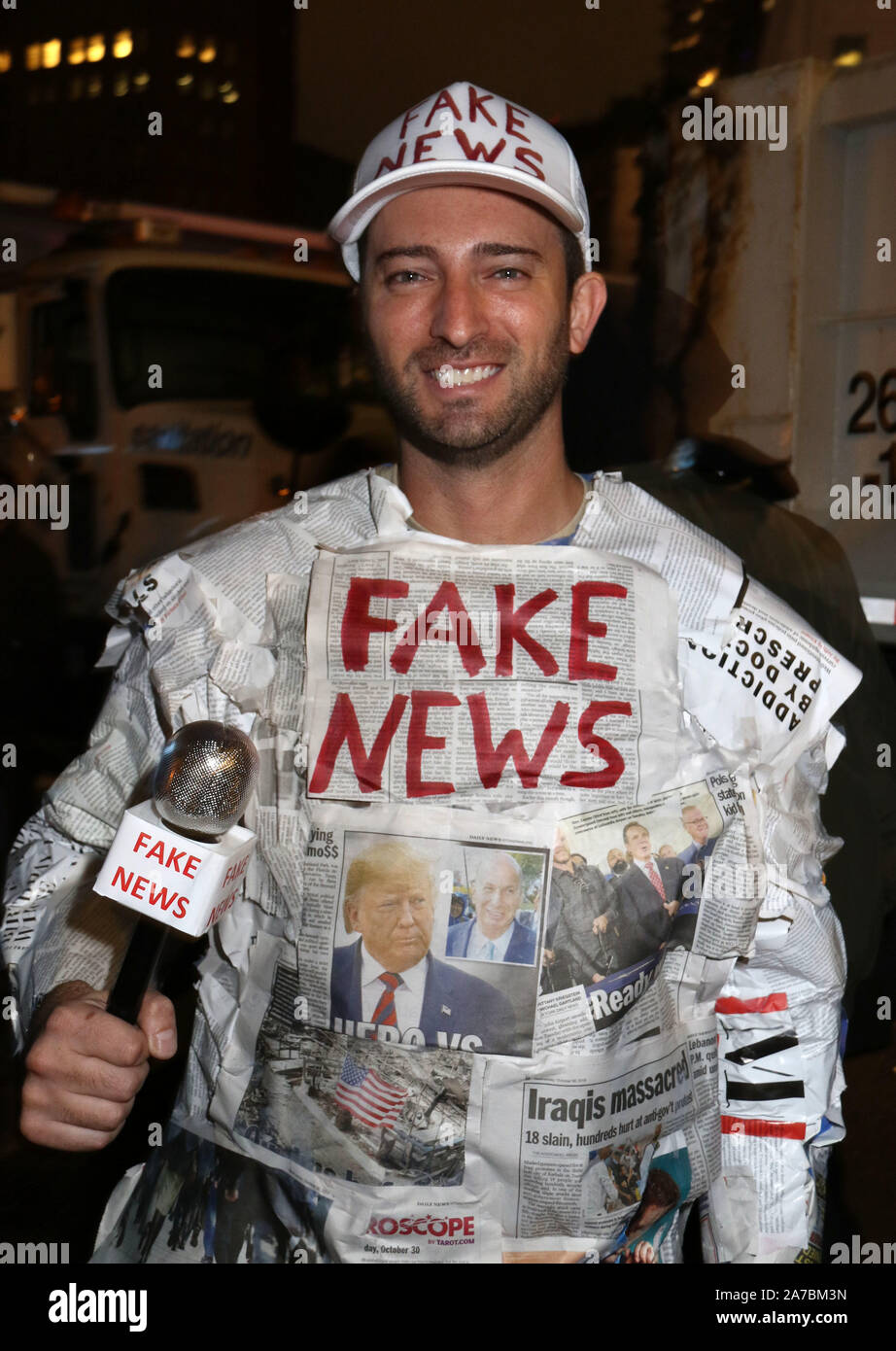 New York, New York, USA. 31st Oct, 2019. A parade goer dressed as 'Fake ...