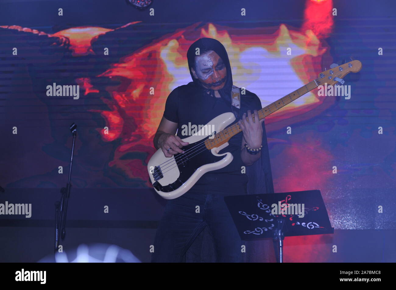 The Filipino band, Band@Work, plays a Halloween show at The Hard Rock ...