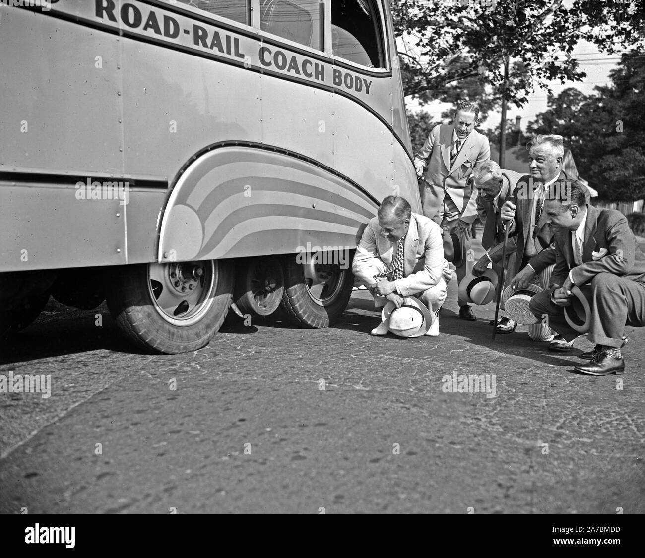 Streamline Bus and Car, Evans Motor Company ca. 1935 Stock Photo - Alamy