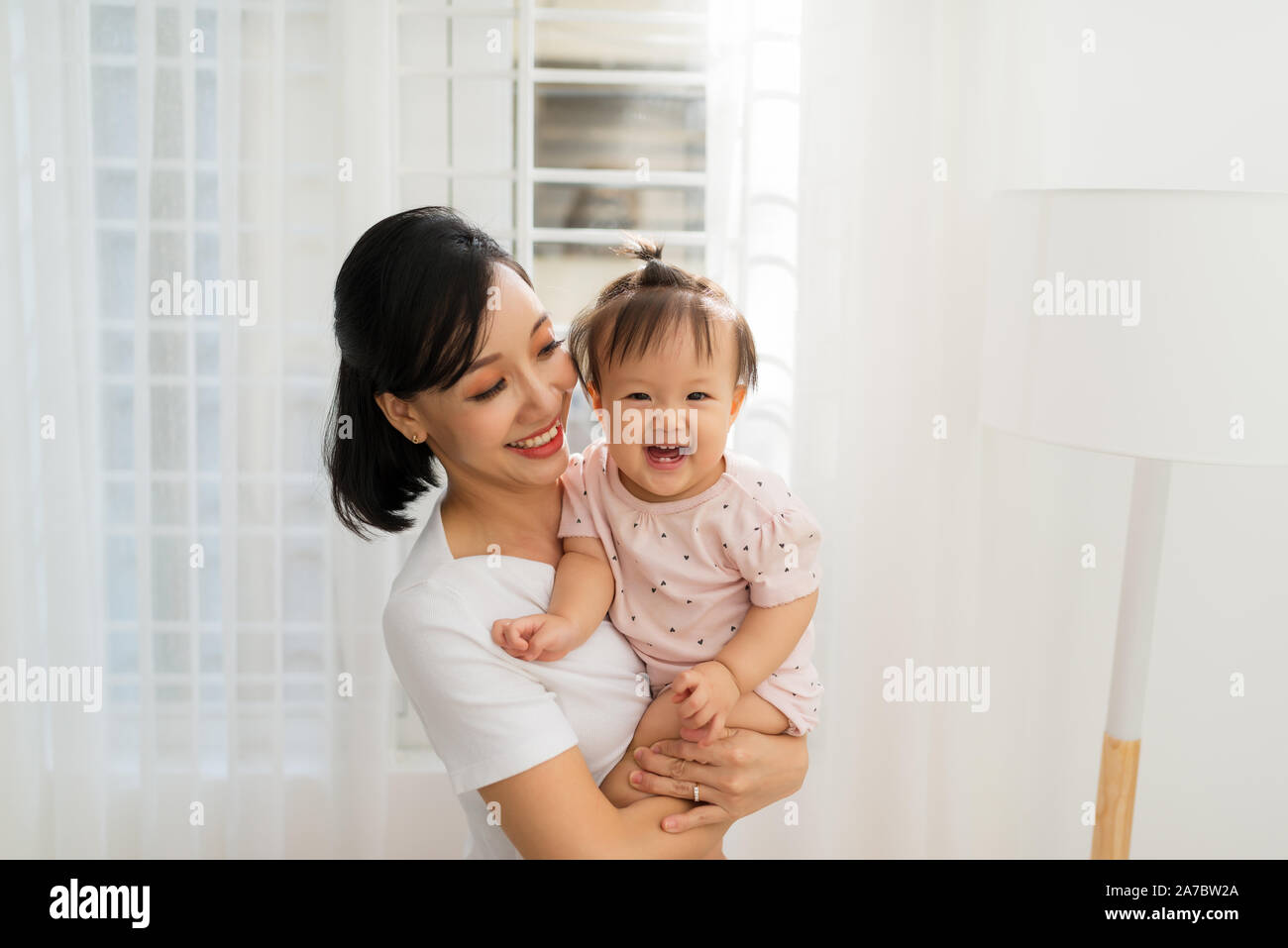 Happy Mother and daughter hugging Stock Photo - Alamy