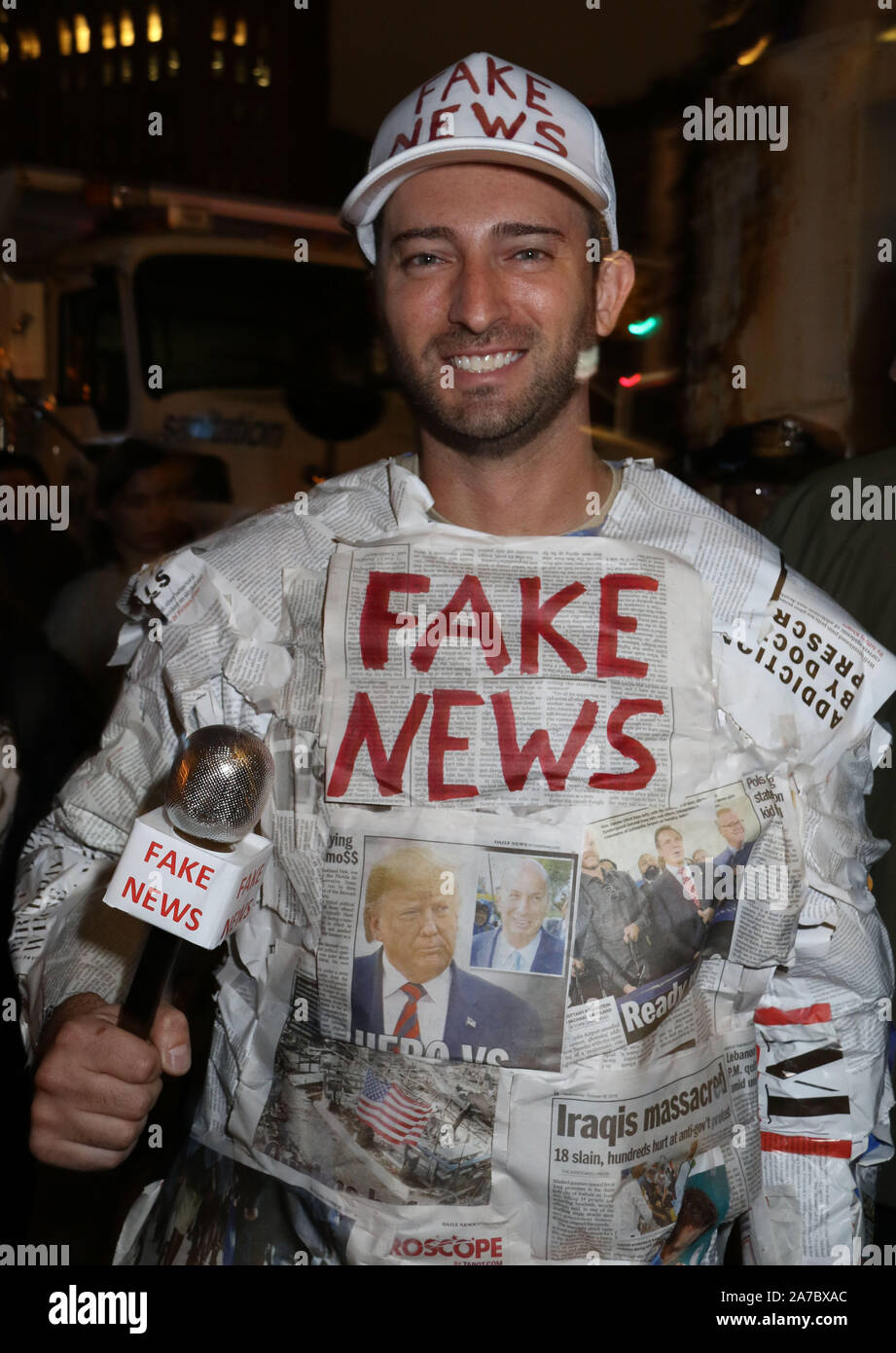 New York, New York, USA. 31st Oct, 2019. A parade goer dressed as 'Fake ...