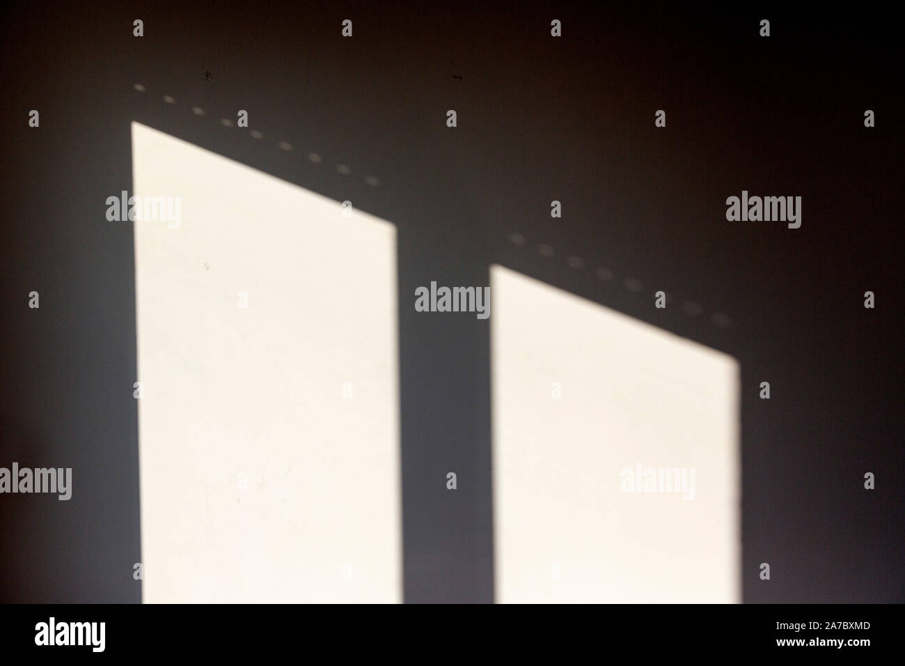 Squares of light on the wall Stock Photo - Alamy