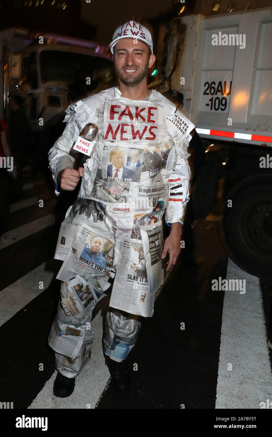 New York, New York, USA. 31st Oct, 2019. A parade goer dressed as 'Fake ...