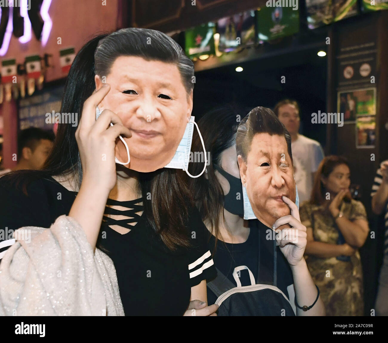 Hong Kong. 31st October, 2019. People holding masks of Chinese ...