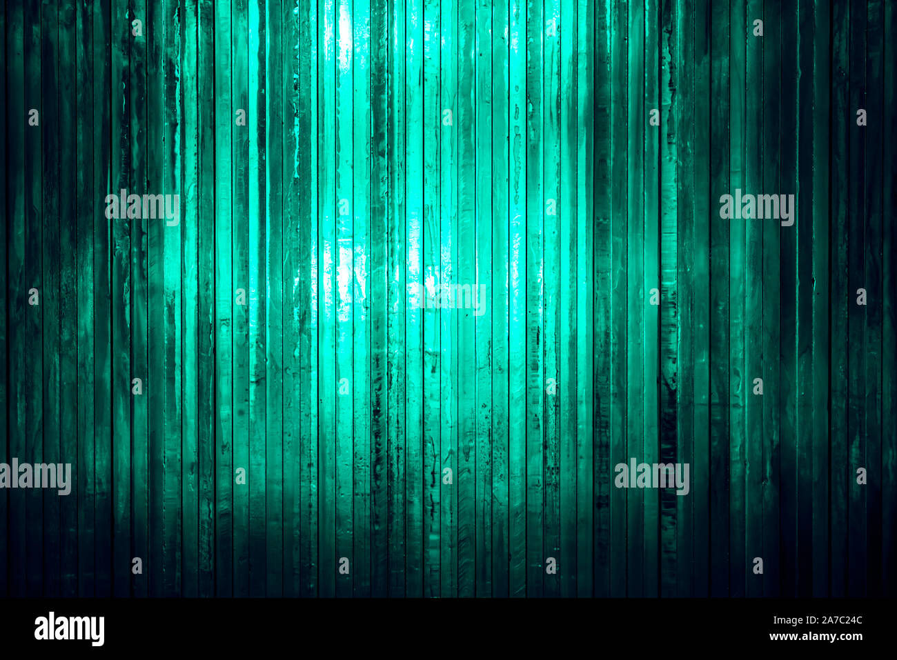 Wall of thick green glass in vertical stripes full frame backdrop Stock ...