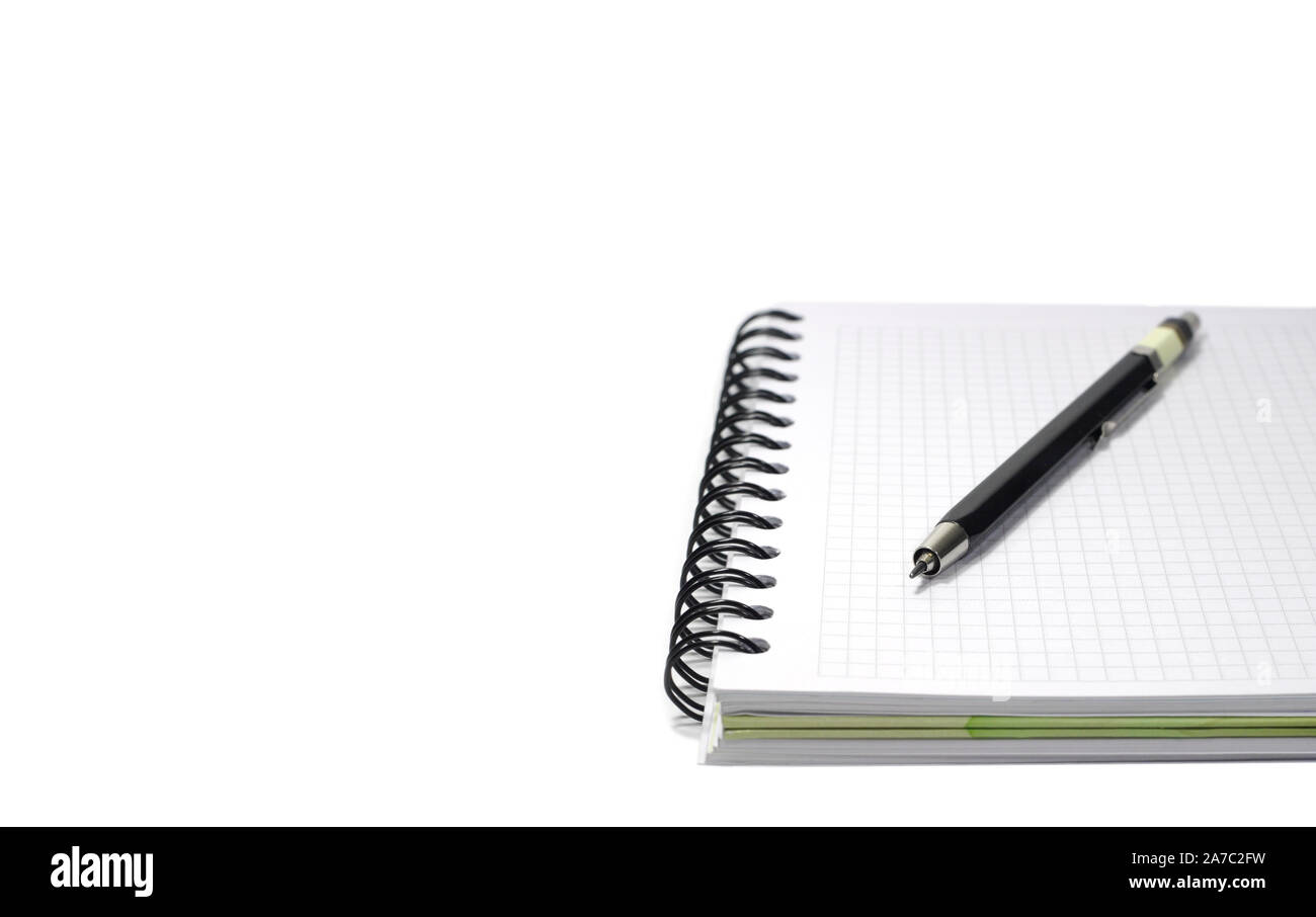 Squared notepad with mechanical pencil isolated on white background ...