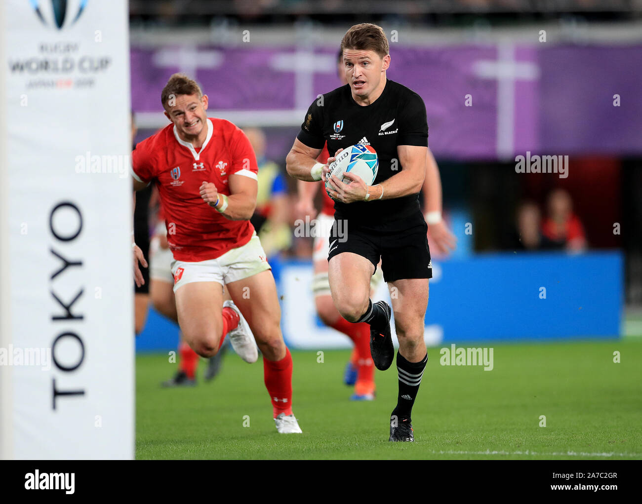 New Zealand's Beauden Barrett on the way to scoring his side's second ...