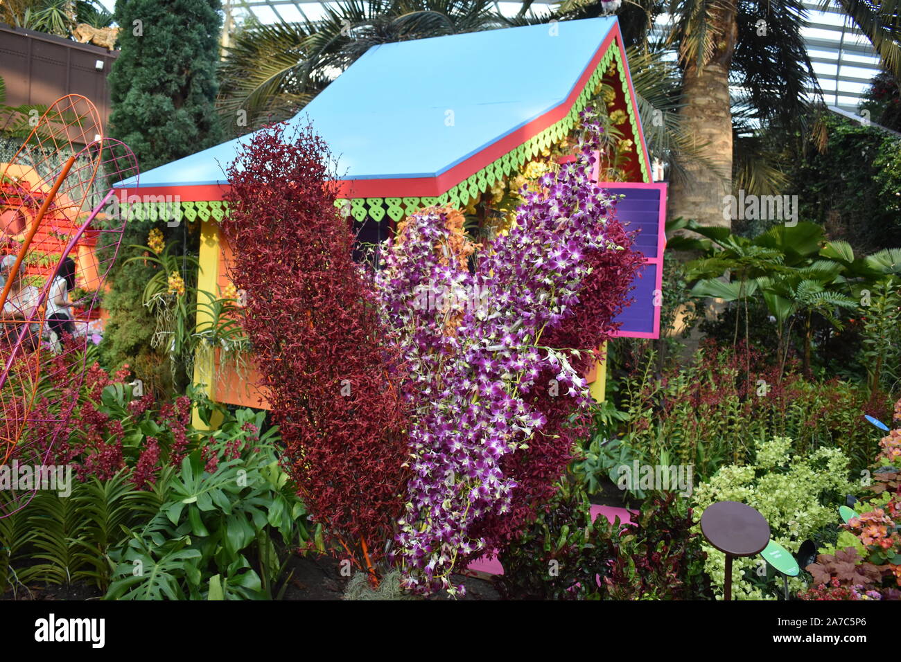 beautiful colorful hut shaped structure in the forest Stock Photo - Alamy