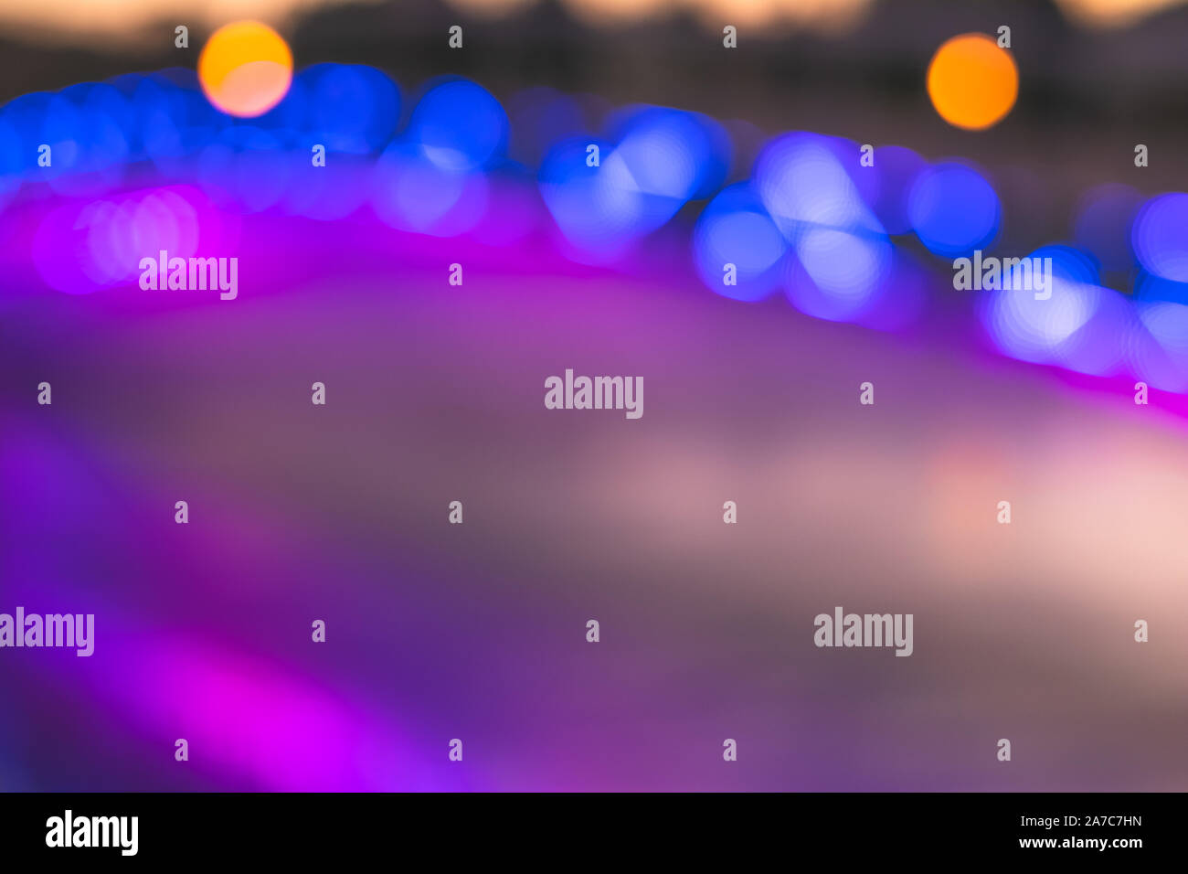 Abstract bokeh background. City night lights. Defocused blurred pattern ...
