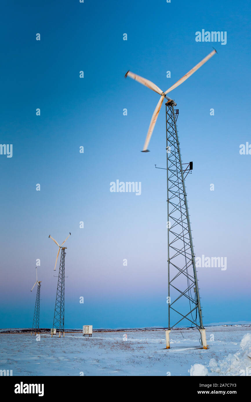 Wind powered generators in the arctic winter at sunset. Kotzebue ...