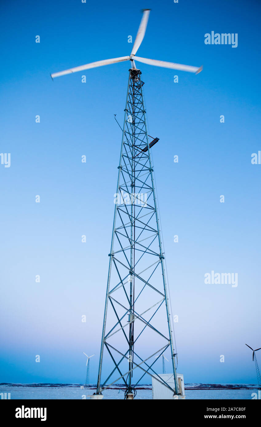 Wind powered generators in the arctic winter at sunset. Kotzebue ...