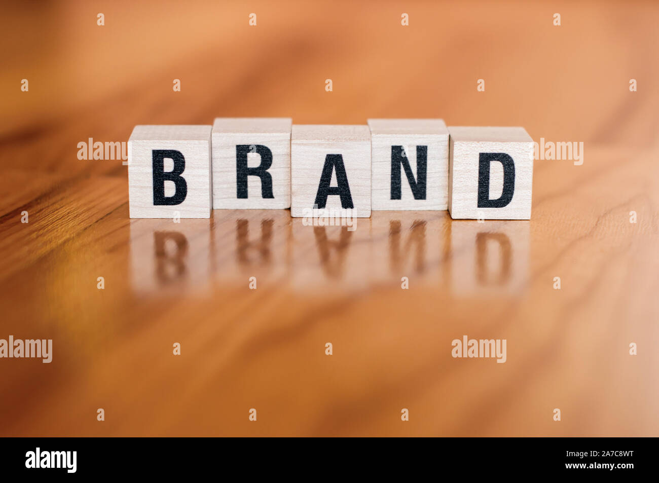 BRAND word on building block Stock Photo - Alamy