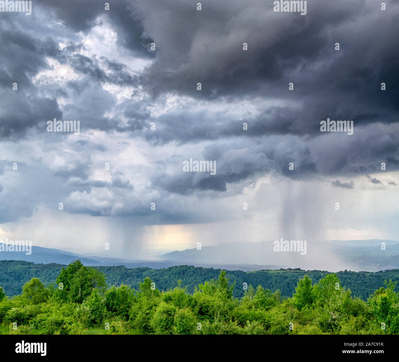 Stormy weather over mountains hi-res stock photography and images - Alamy