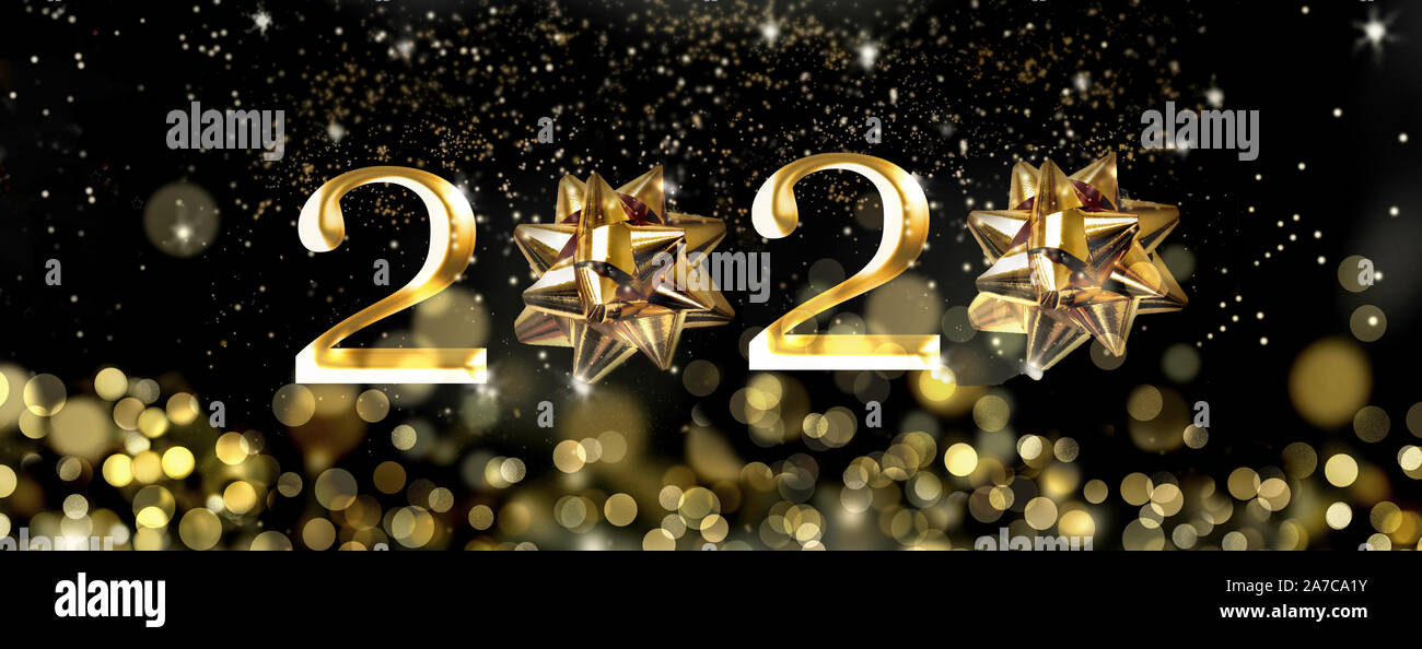2020 golden figures with ribbon new year in the blur lights in abstract ...