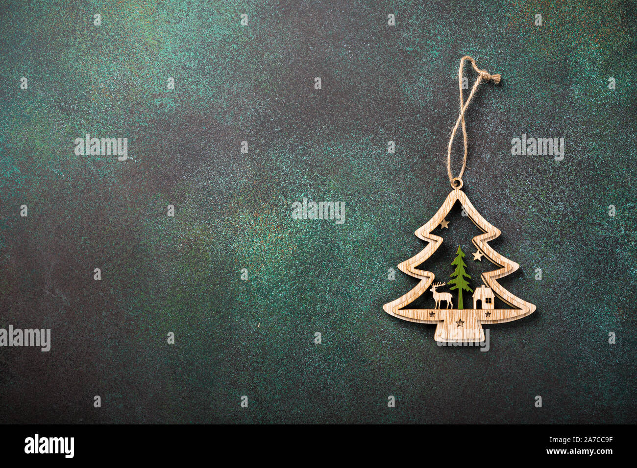 Festive background with wooden christmas tree Stock Photo - Alamy