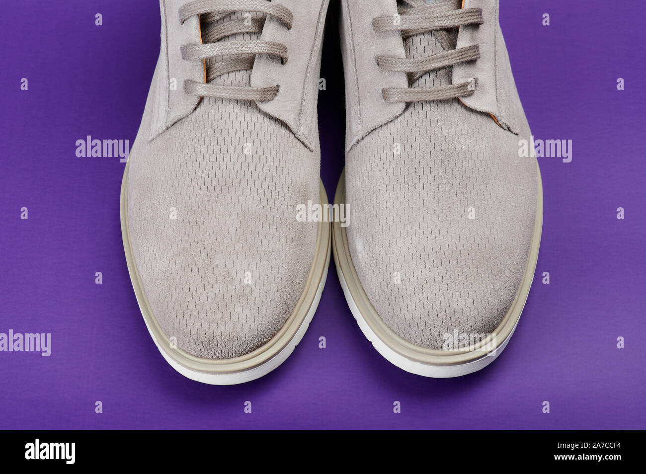 Close up of gray man pair shoes above top view Stock Photo - Alamy