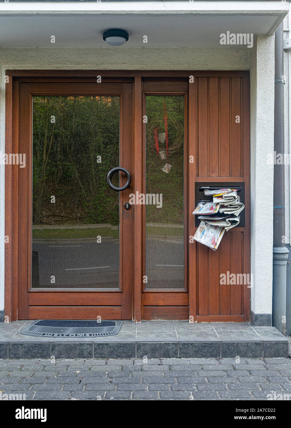 glass door with mailbox. door in the house Stock Photo - Alamy
