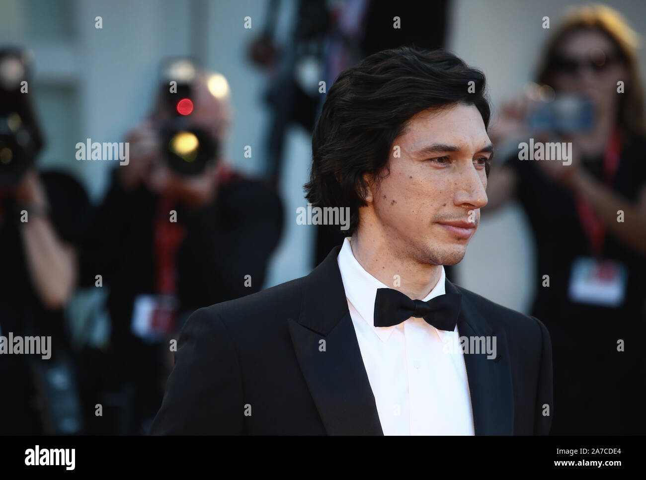 VENICE, ITALY - AUGUST 29,2019: Adam Driver walks the red carpet ahead ...