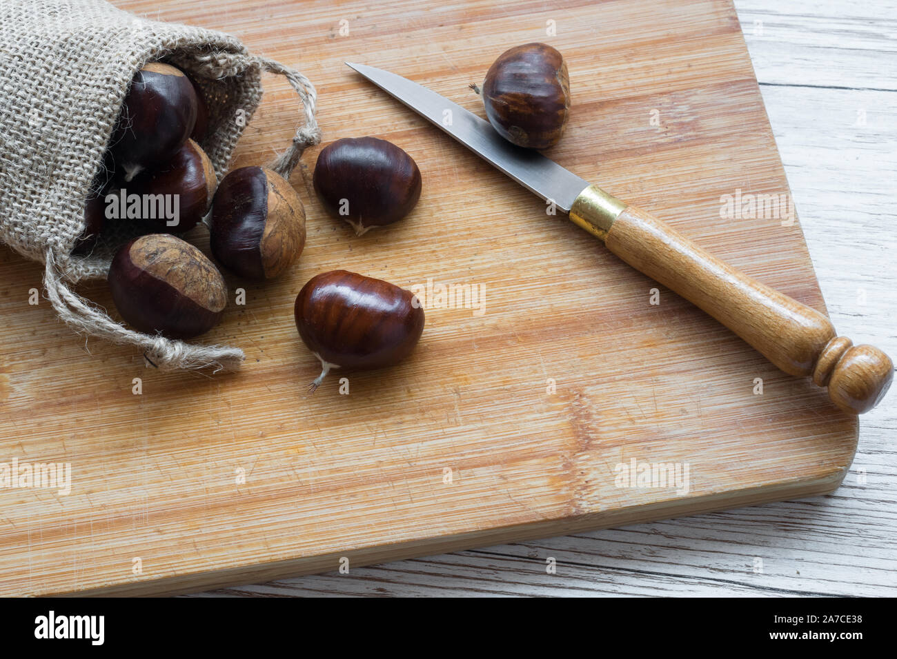 chestnuts inside a small sack Stock Photo - Alamy